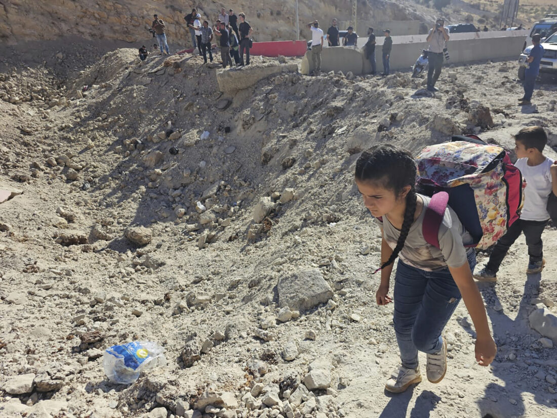 Israeli airstrikes rock southern suburbs of Beirut, cut off a key ...